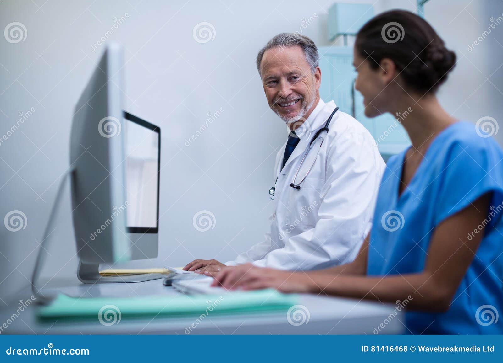 Doctor and Nurse Working on Computer Stock Photo - Image of nurse, coat ...