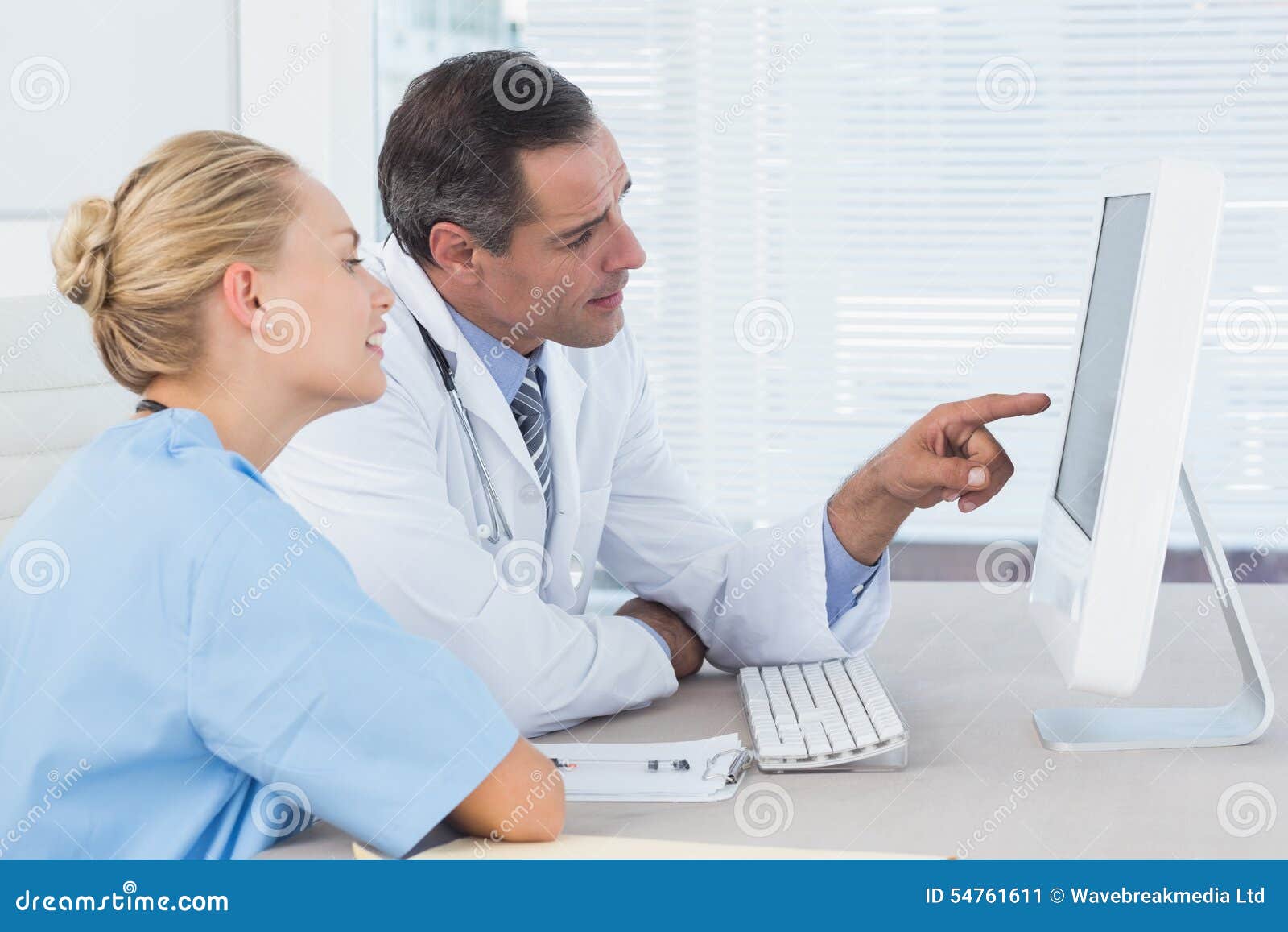 Doctor and Nurse Working with Computer Stock Image - Image of male ...