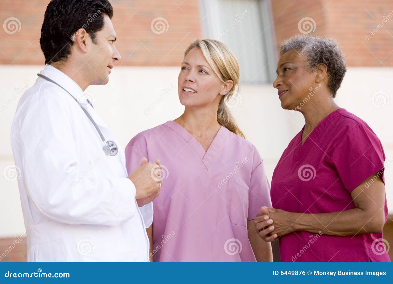 Doctor and Nurses Standing Outside a Hospital Stock Photo - Image of ...