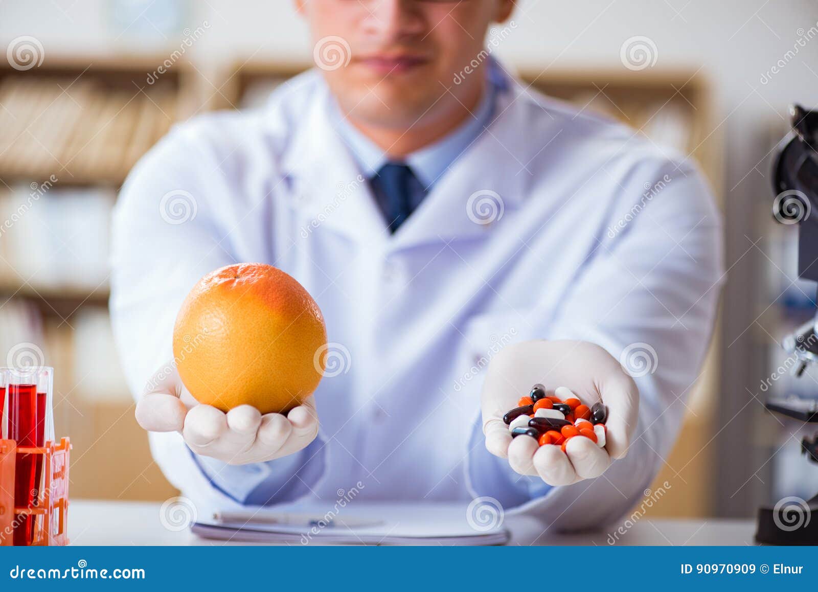 The Doctor Offering the Choice between Healthy and Vitamins Stock Image ...