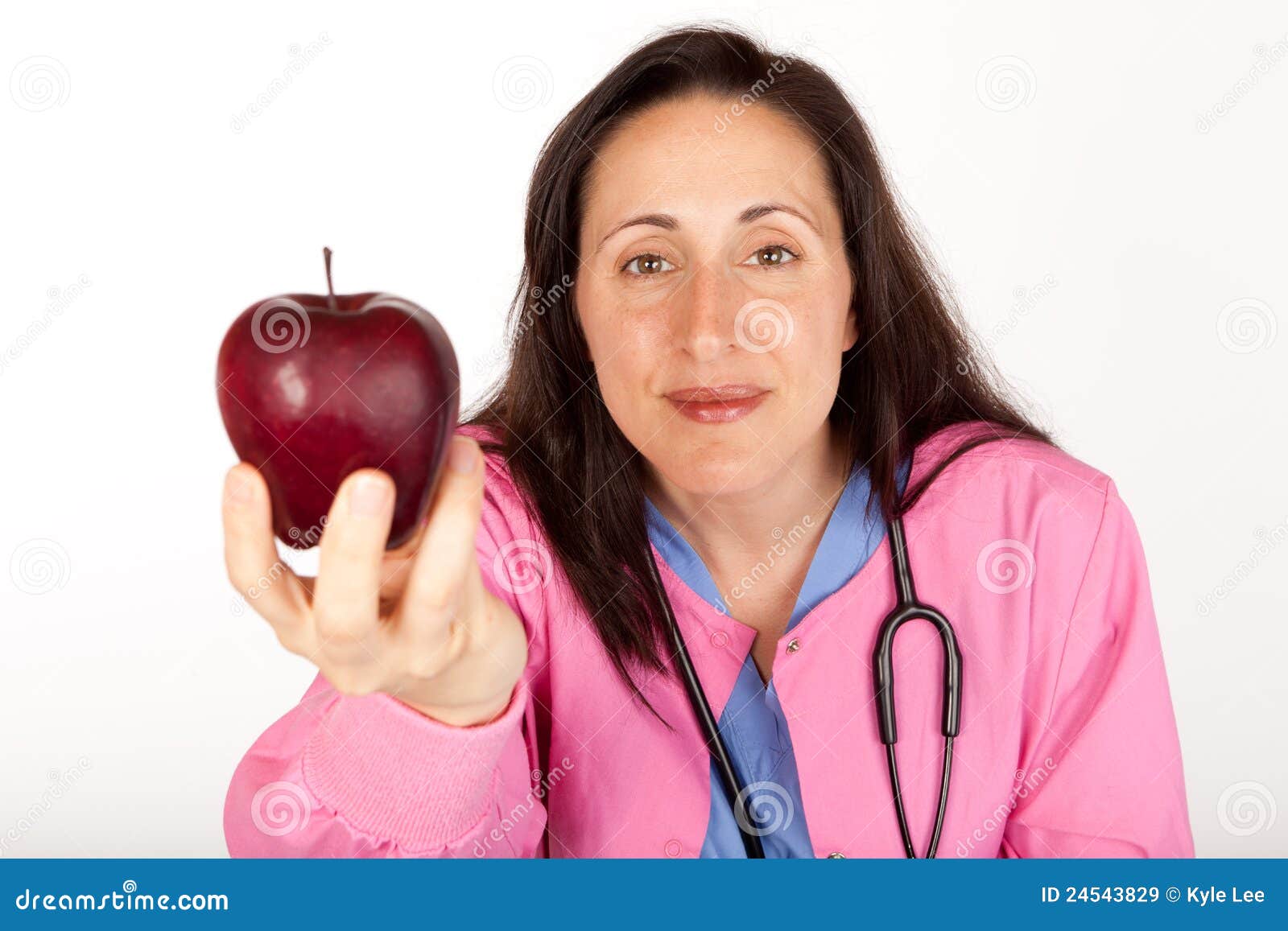 Doctor Offers Apple stock image. Image of medical, offering - 24543829
