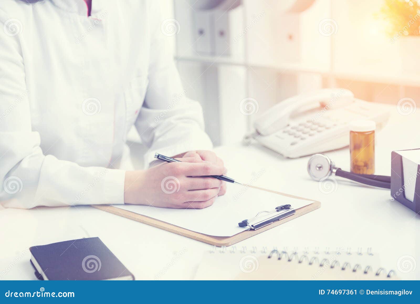 Doctor at office hours stock image. Image of assistance - 74697361
