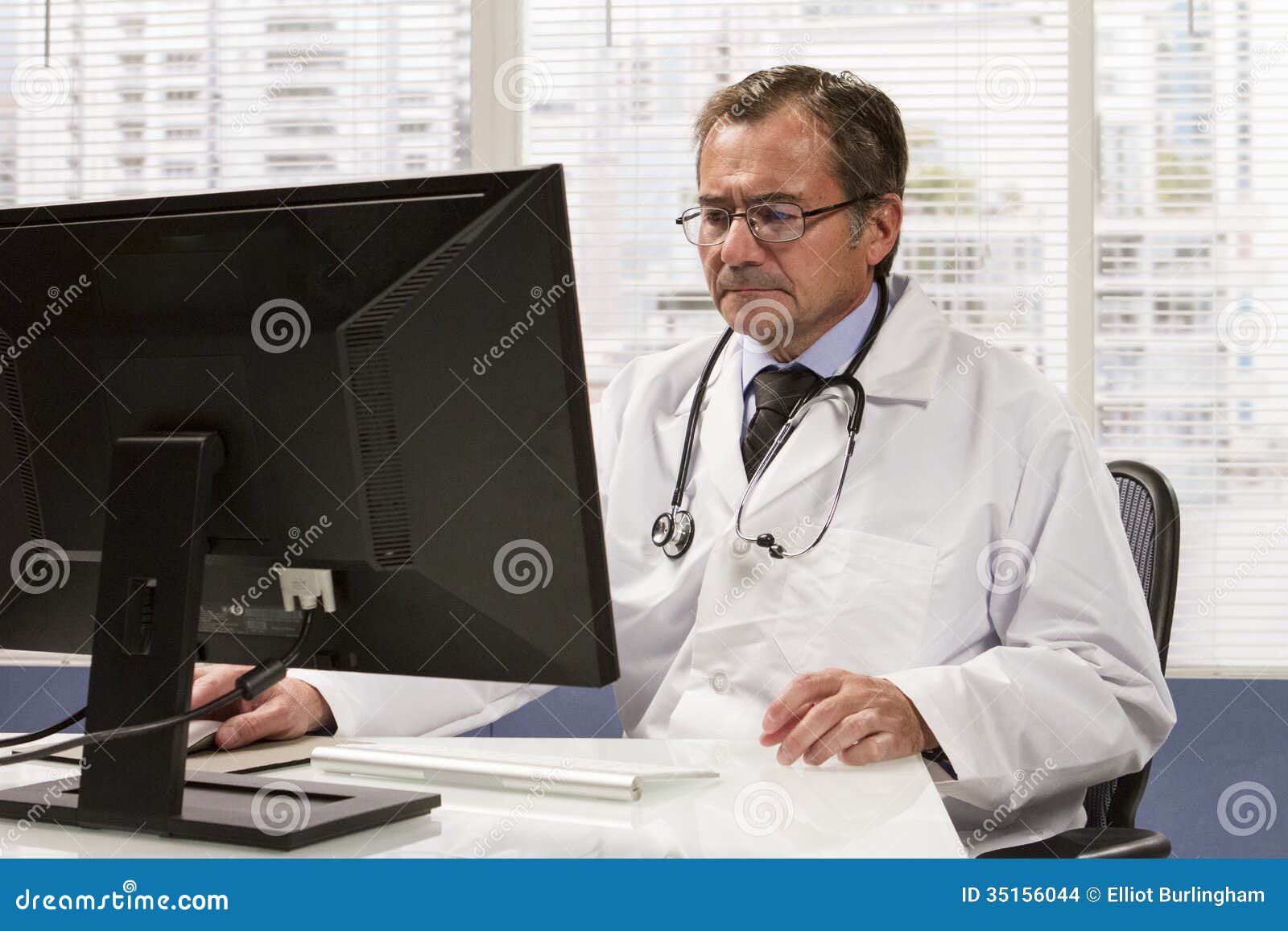 Doctor in Office Using Computer, Horizontal Stock Photo - Image of ...