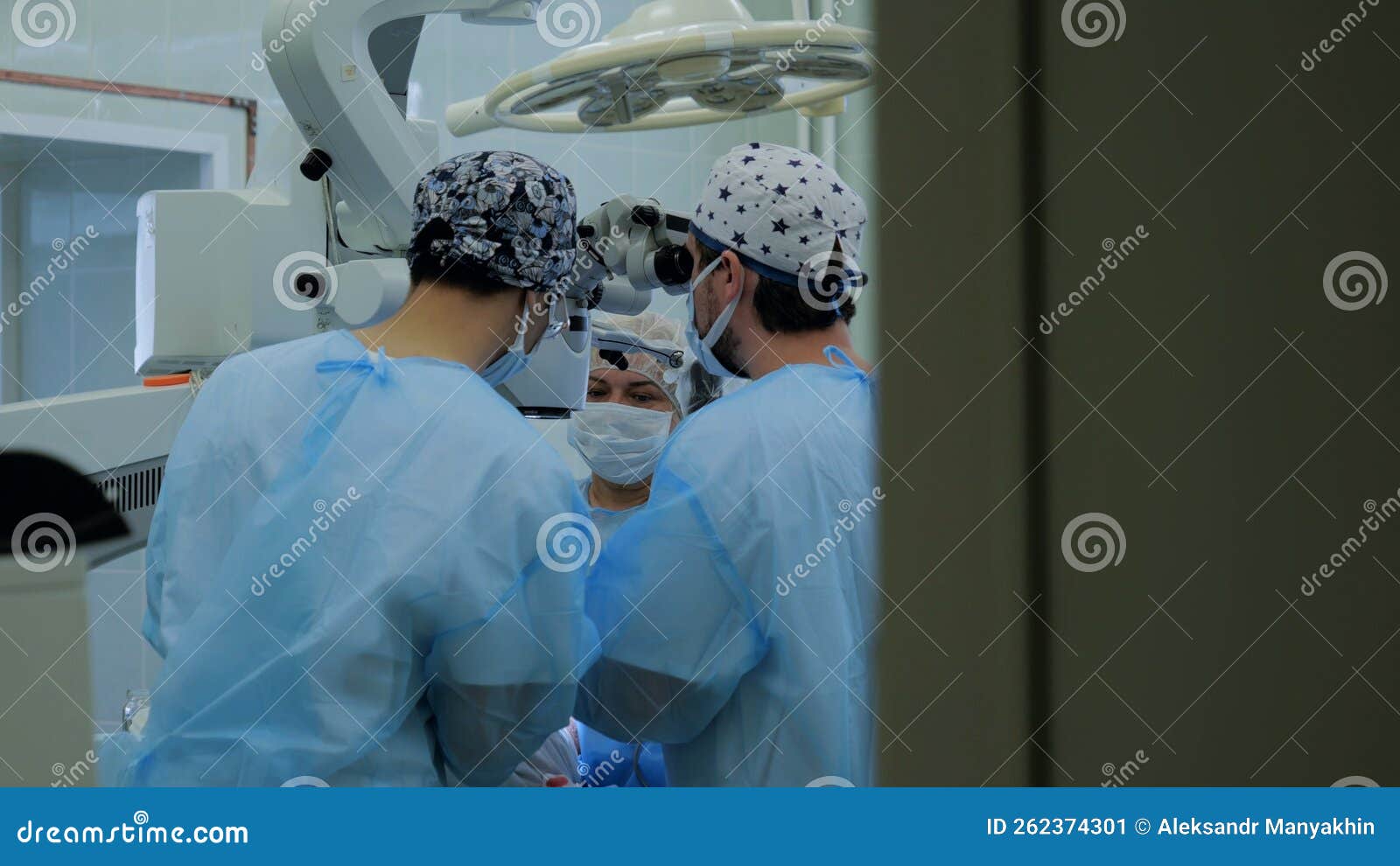 The Doctor Operates Using a Microscope during Nerve Surgery. the ...