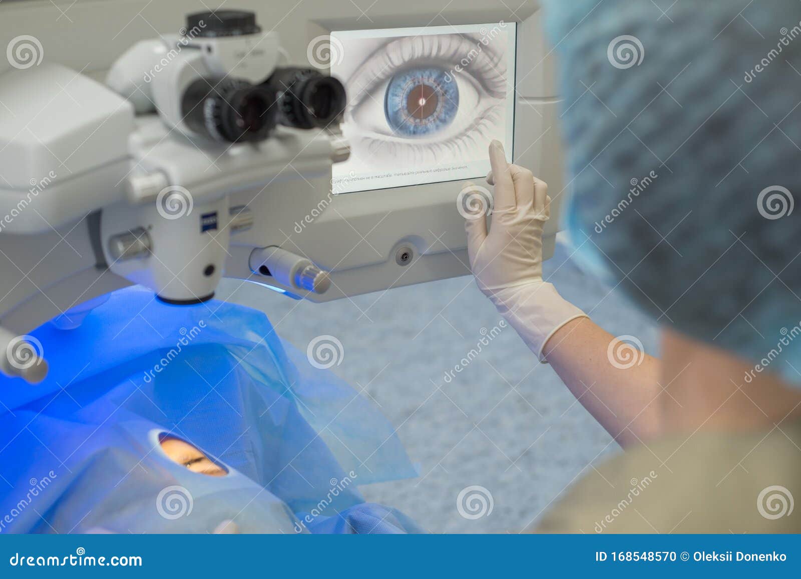 Doctor Ophthalmologist, Pressing the Button on the Control Display To ...