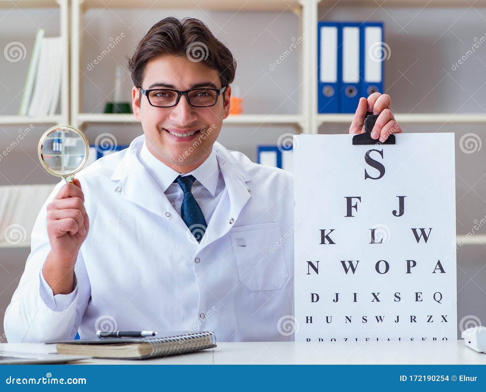 Doctor Optician with Letter Chart Conducting an Eye Test Check Stock ...