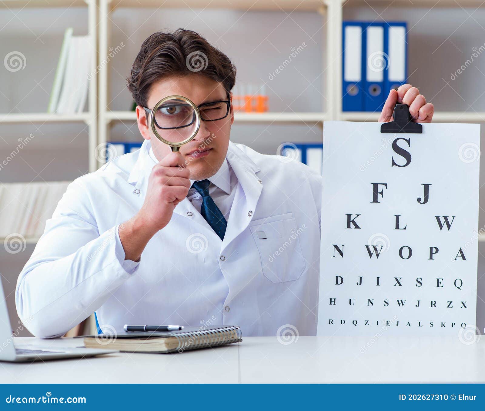Doctor Optician with Letter Chart Conducting an Eye Test Check Stock ...