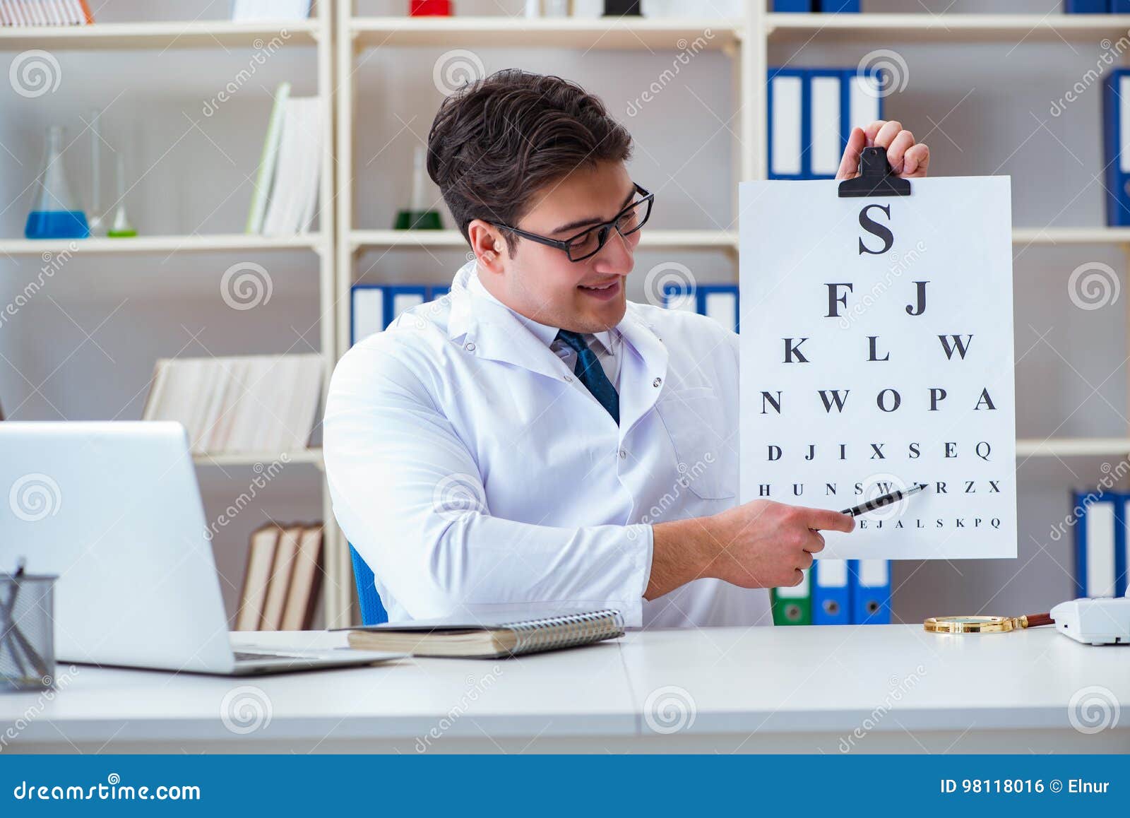 The Doctor Optician with Letter Chart Conducting an Eye Test Check ...
