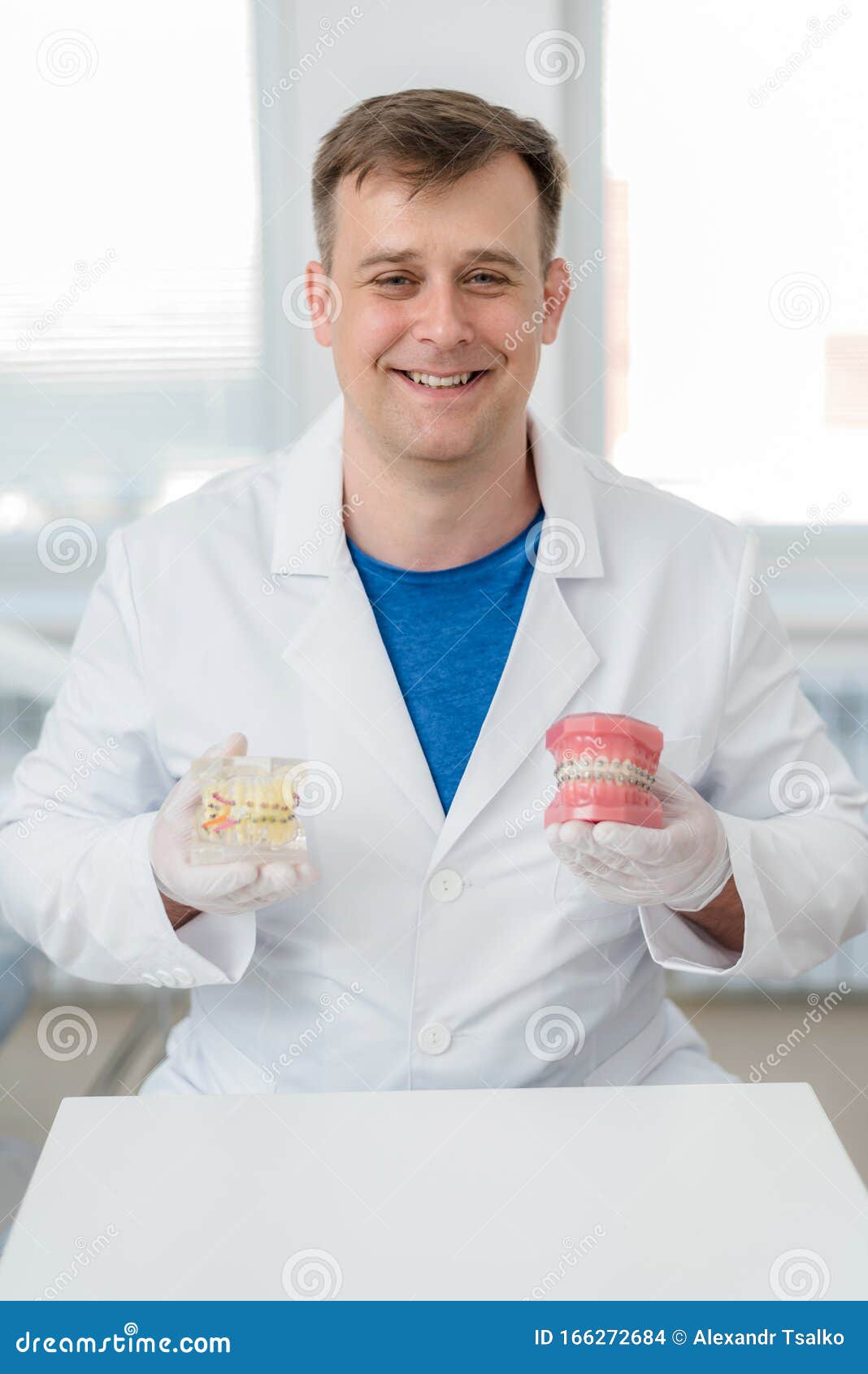 Doctor Orthodontist Shows How the System of Braces on Teeth is Arranged ...