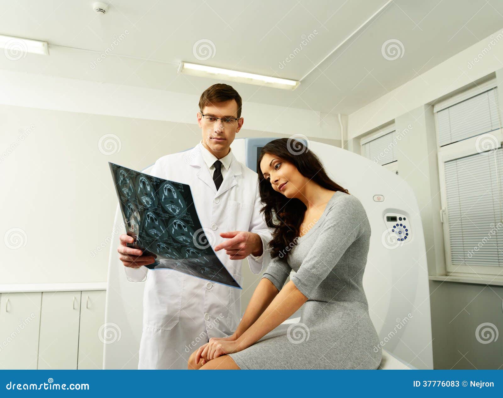 Doctor with Patient at the Computed Tomography Stock Image - Image of ...
