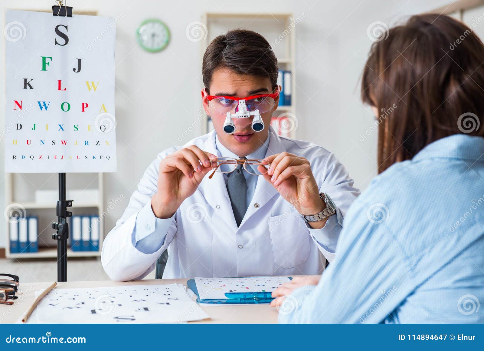 The Doctor with Patient at Eye Exam Stock Image - Image of myopia, exam ...