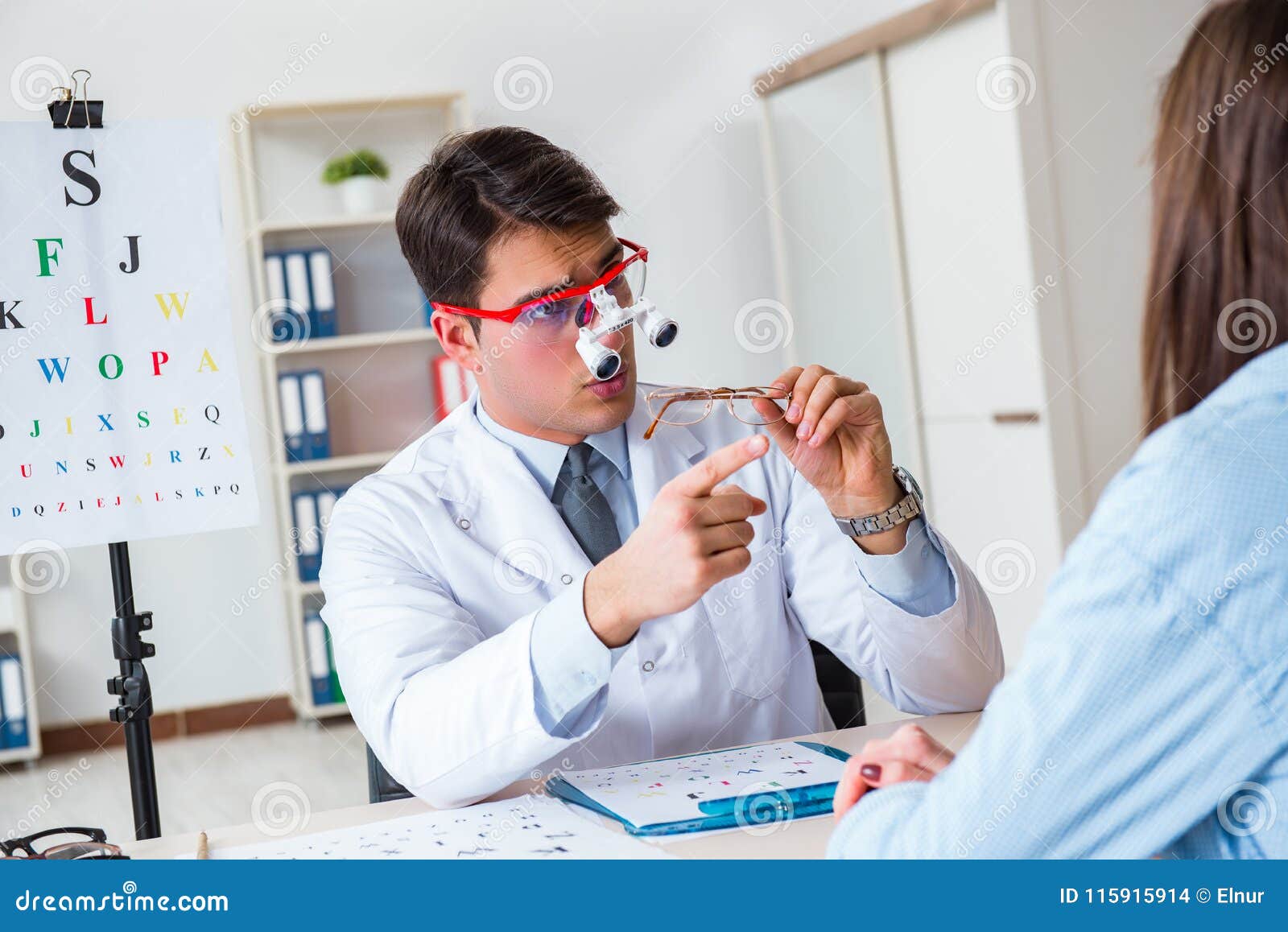 The Doctor with Patient at Eye Exam Stock Photo - Image of eyesight ...