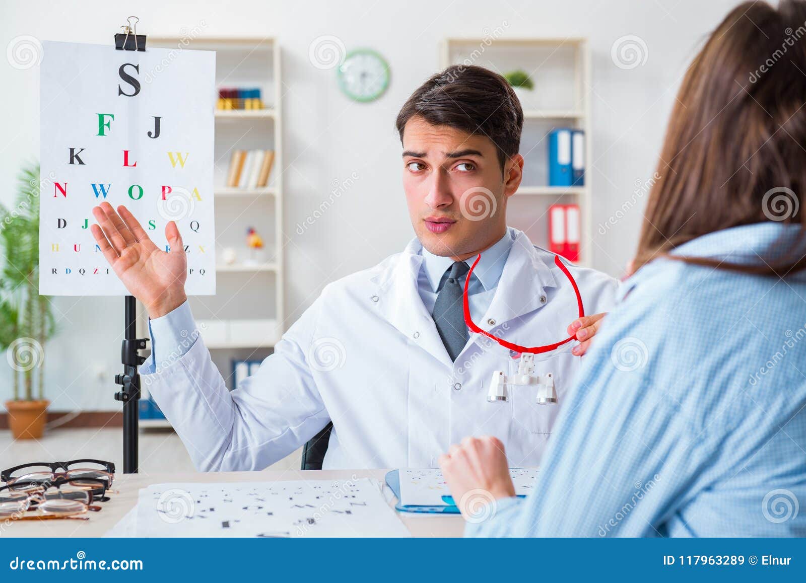 The Doctor with Patient at Eye Exam Stock Image - Image of myopia ...