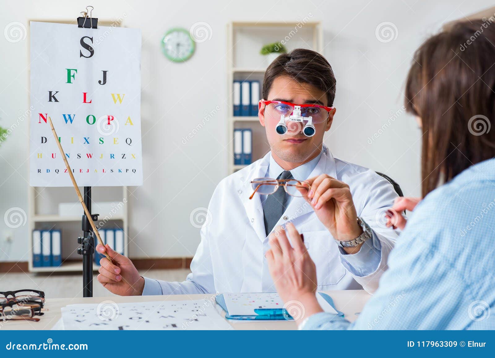 The Doctor with Patient at Eye Exam Stock Image - Image of diagnostic ...
