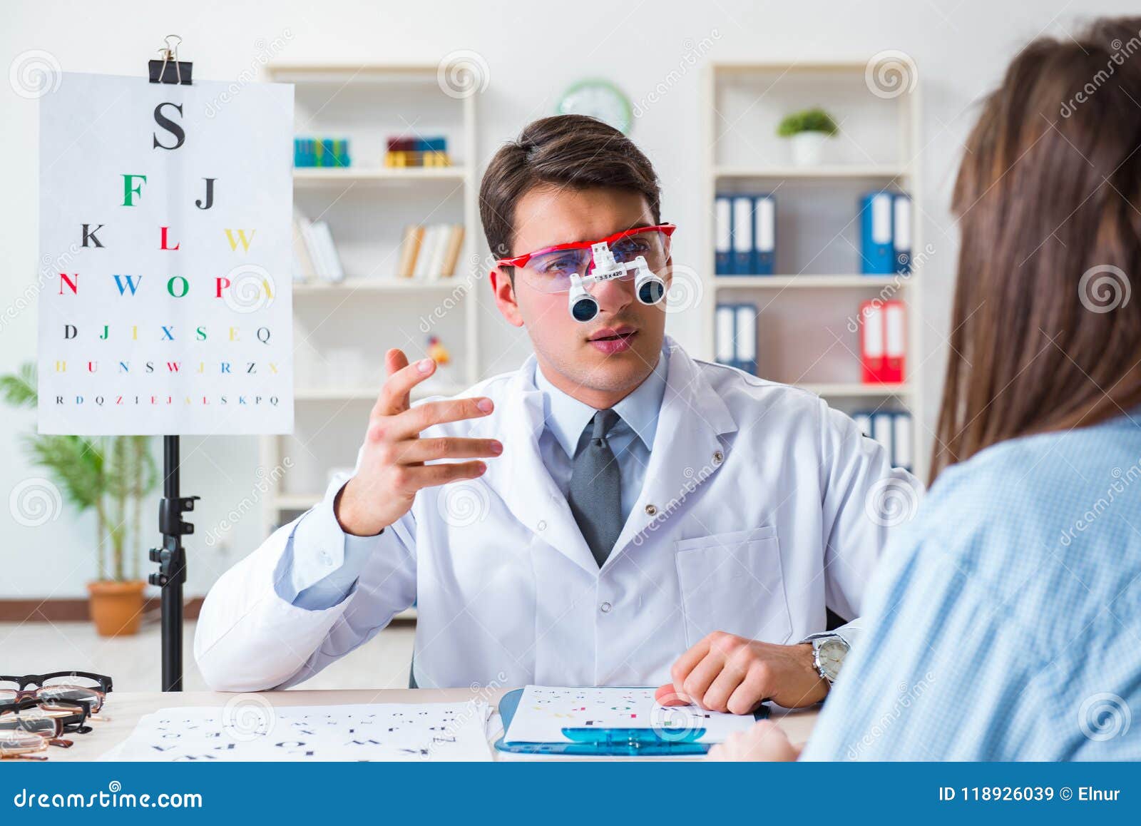 The Doctor with Patient at Eye Exam Stock Image - Image of eyewear ...