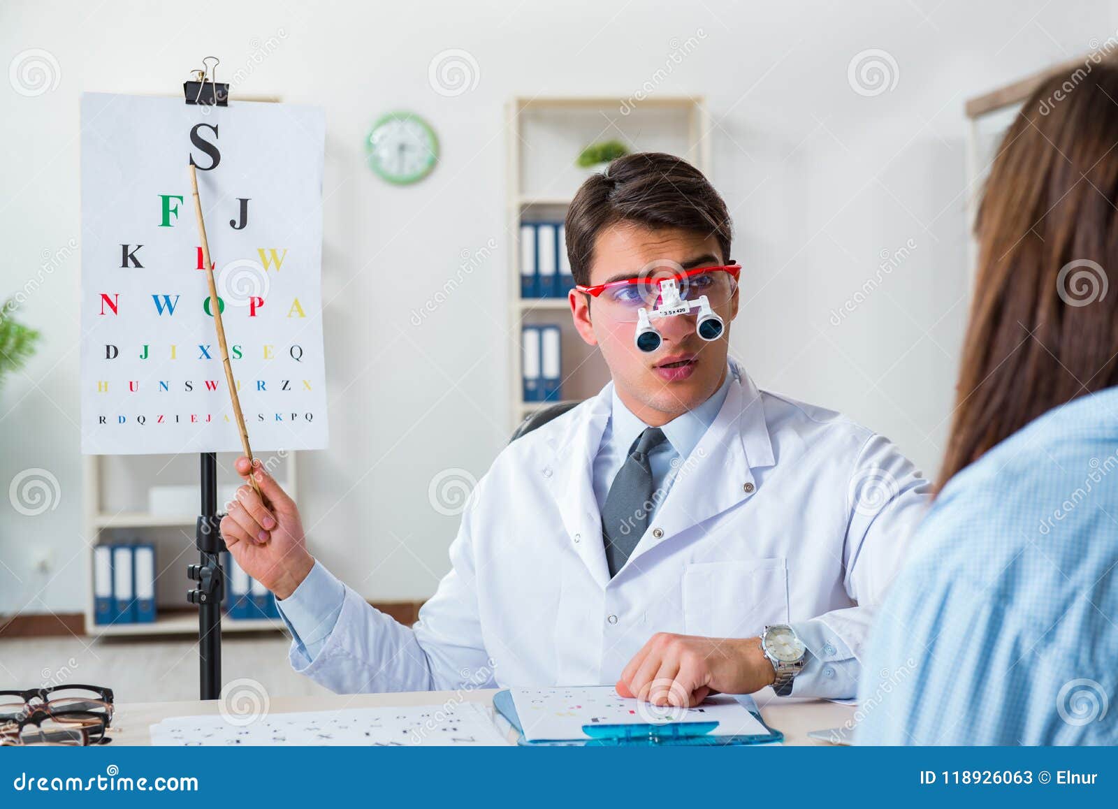 The Doctor with Patient at Eye Exam Stock Image - Image of oculist ...
