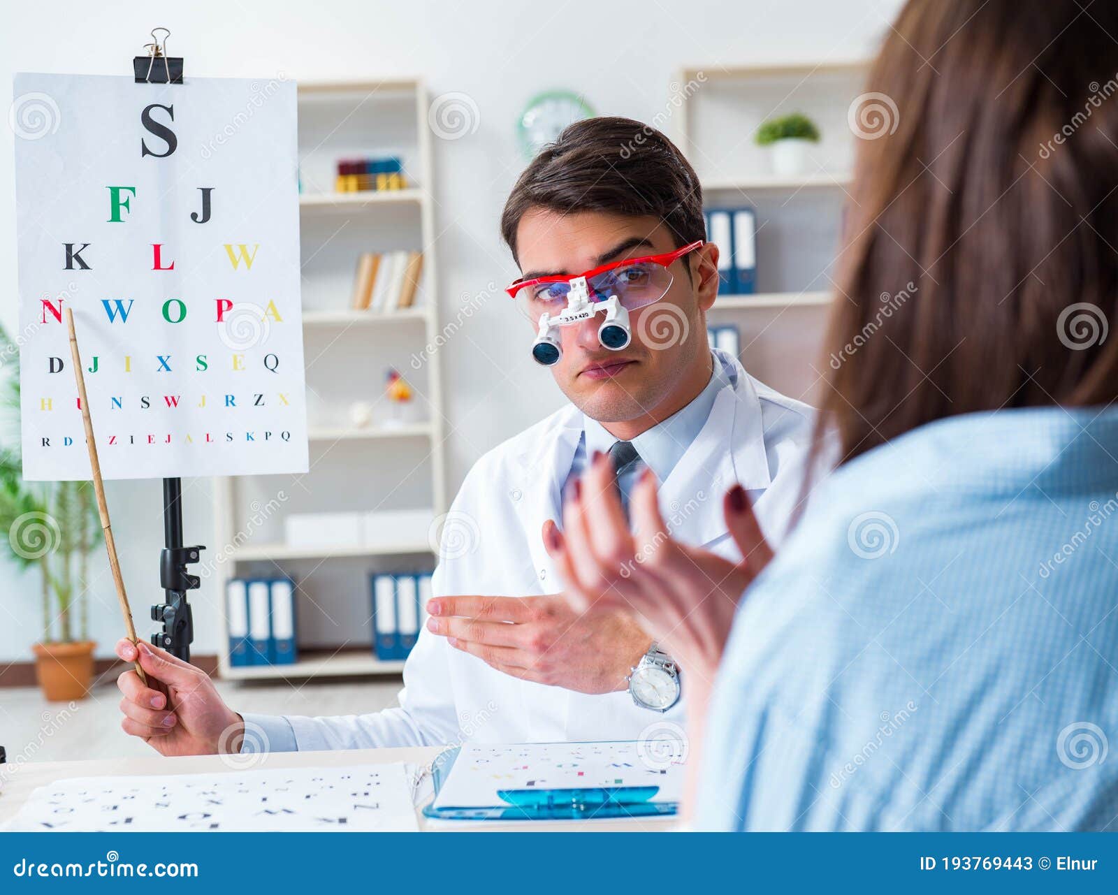 Doctor with Patient at Eye Exam Stock Image - Image of oculist, doctor ...