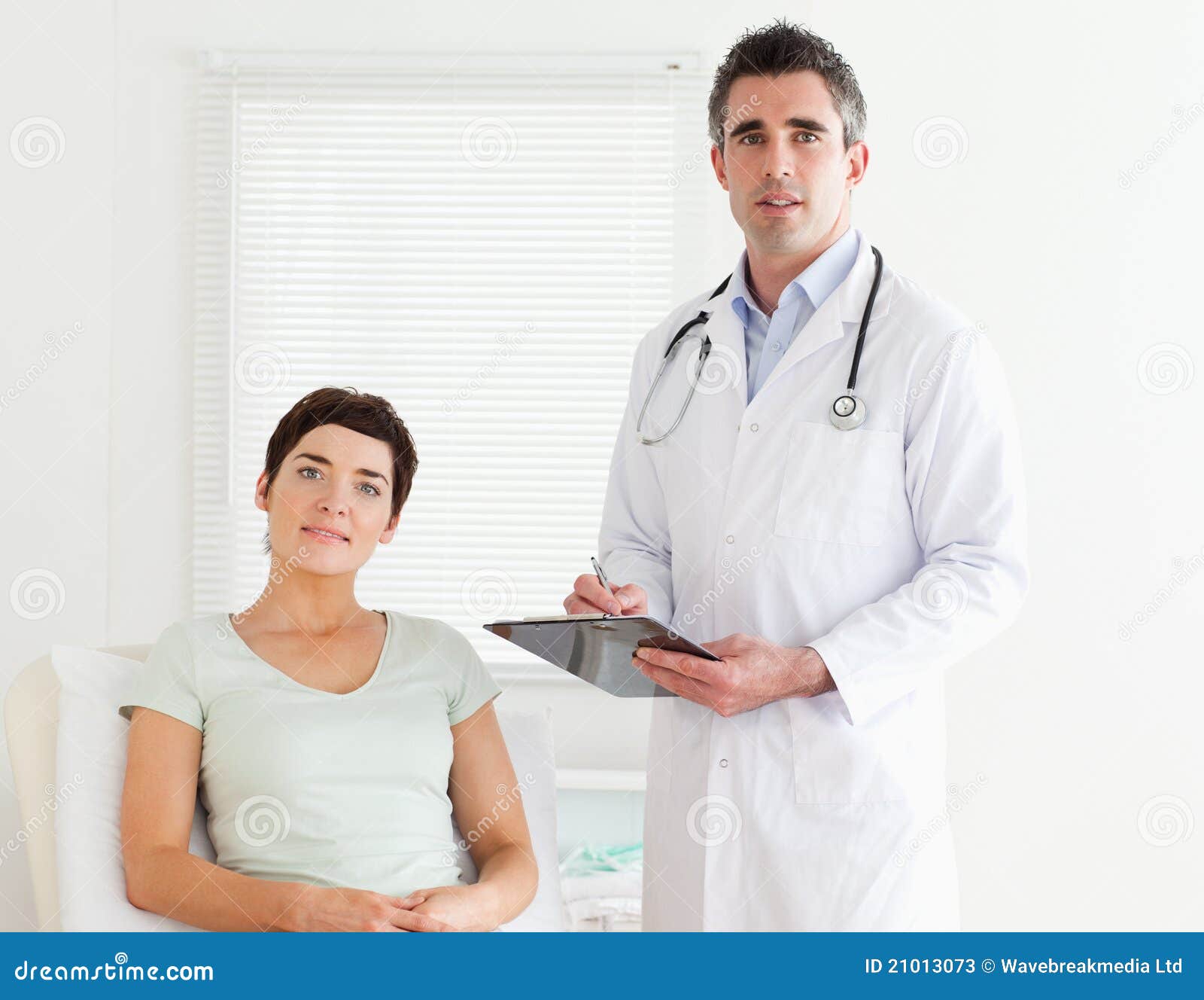 Doctor and Patient Looking into a Camera Stock Image - Image of holding ...