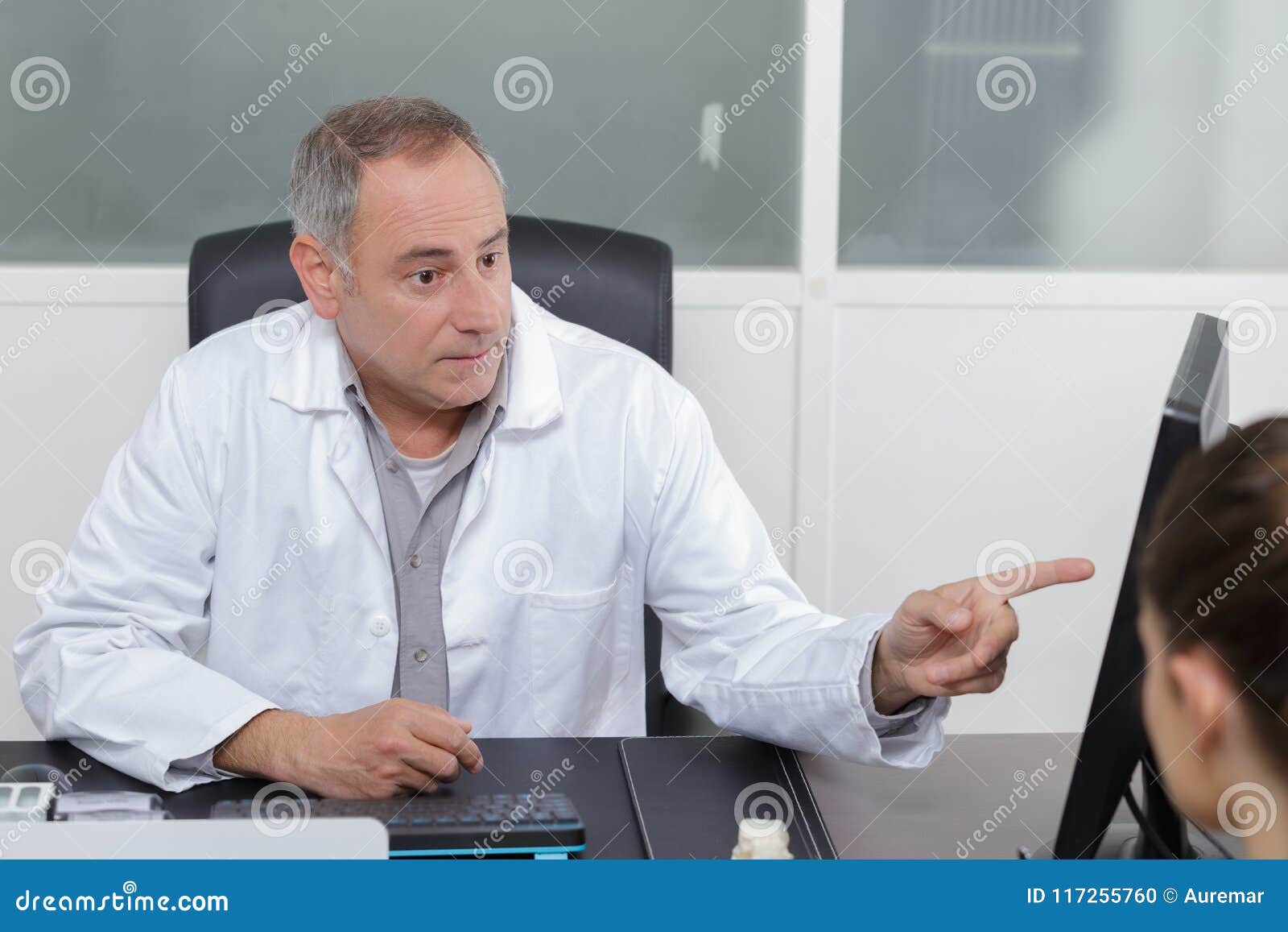 Doctor and Patient Pointing on Computer Stock Photo - Image of ...