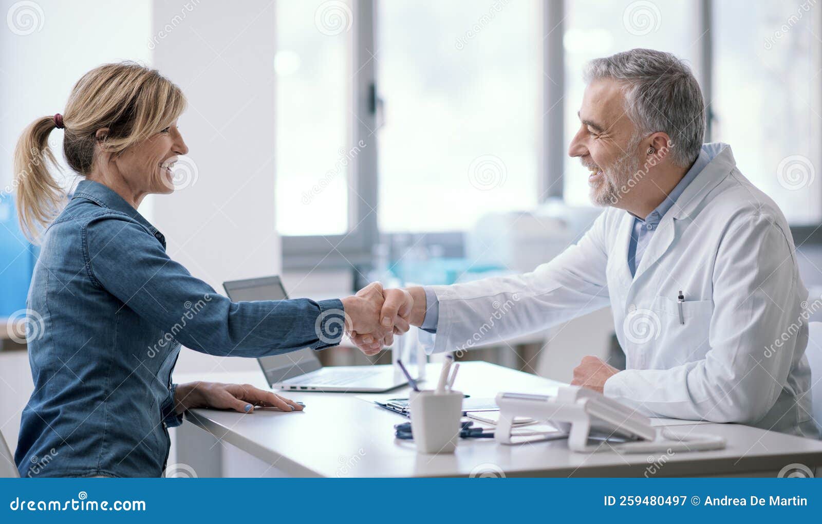 Doctor and Patient Shaking Hands Stock Image - Image of woman, clinic ...