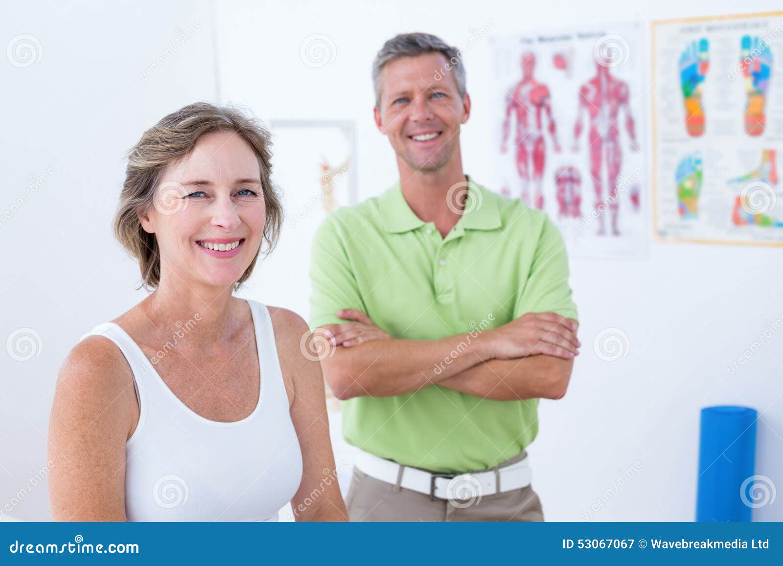 Doctor and Patient Smiling at Camera Stock Image - Image of mature ...