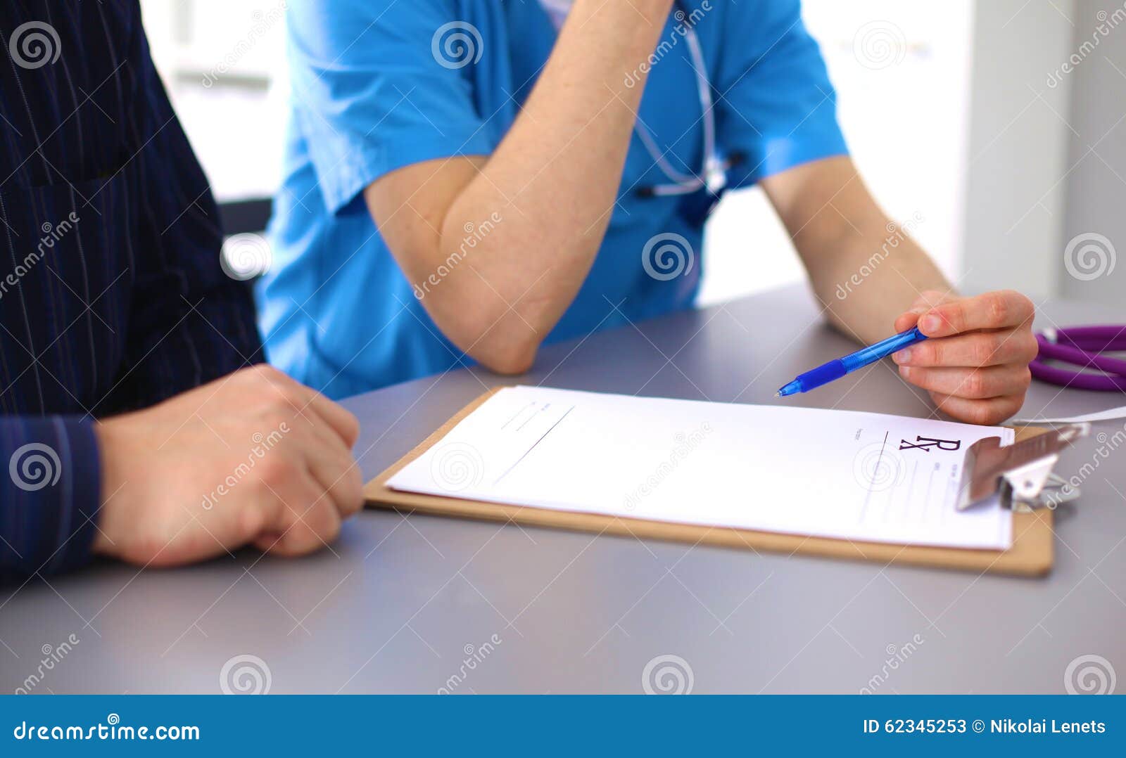 Doctor and Patient at the Table. Solution Stock Image - Image of ...