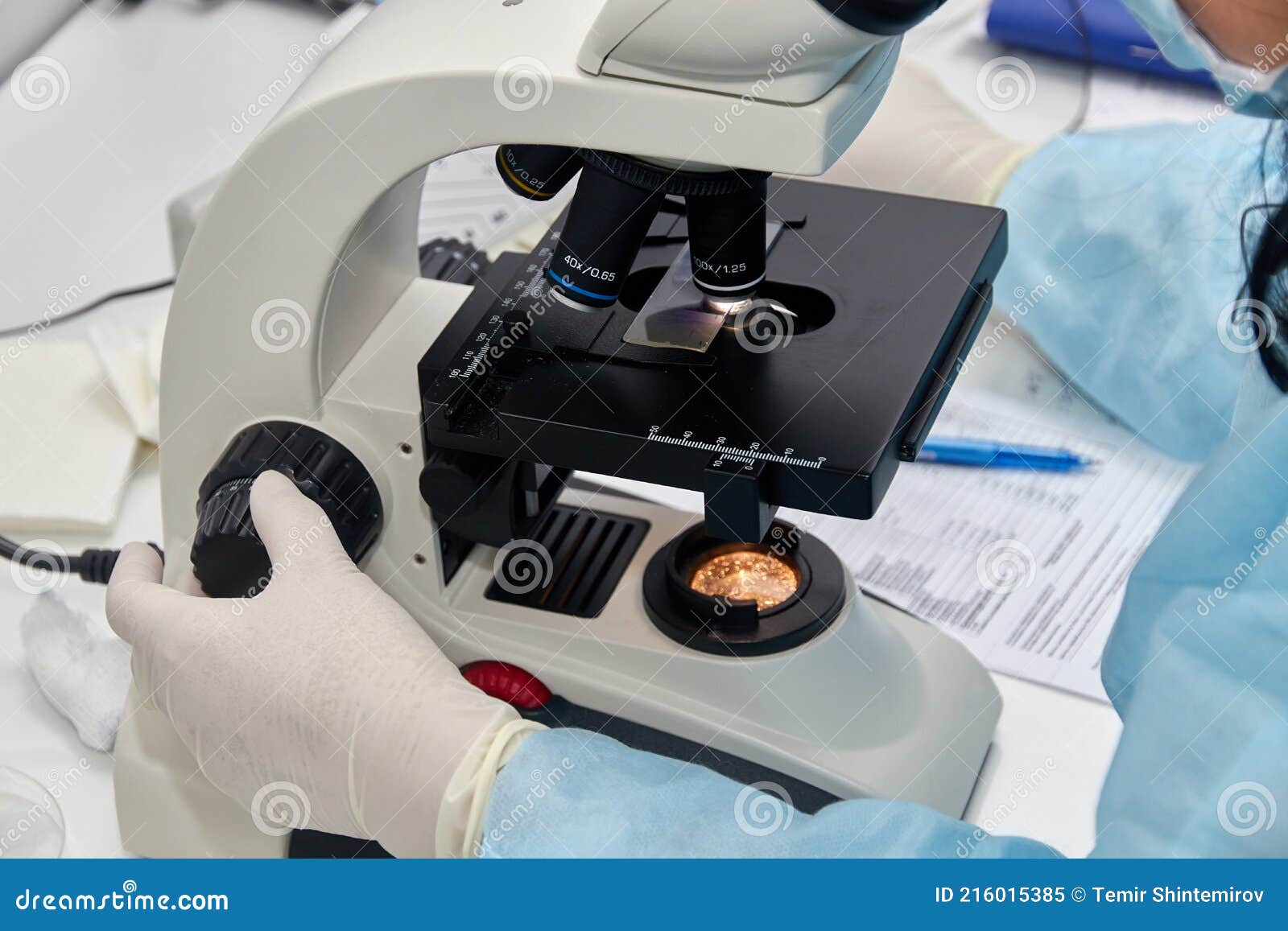 Doctor Performing a Blood Test on a Microscope Stock Image - Image of ...