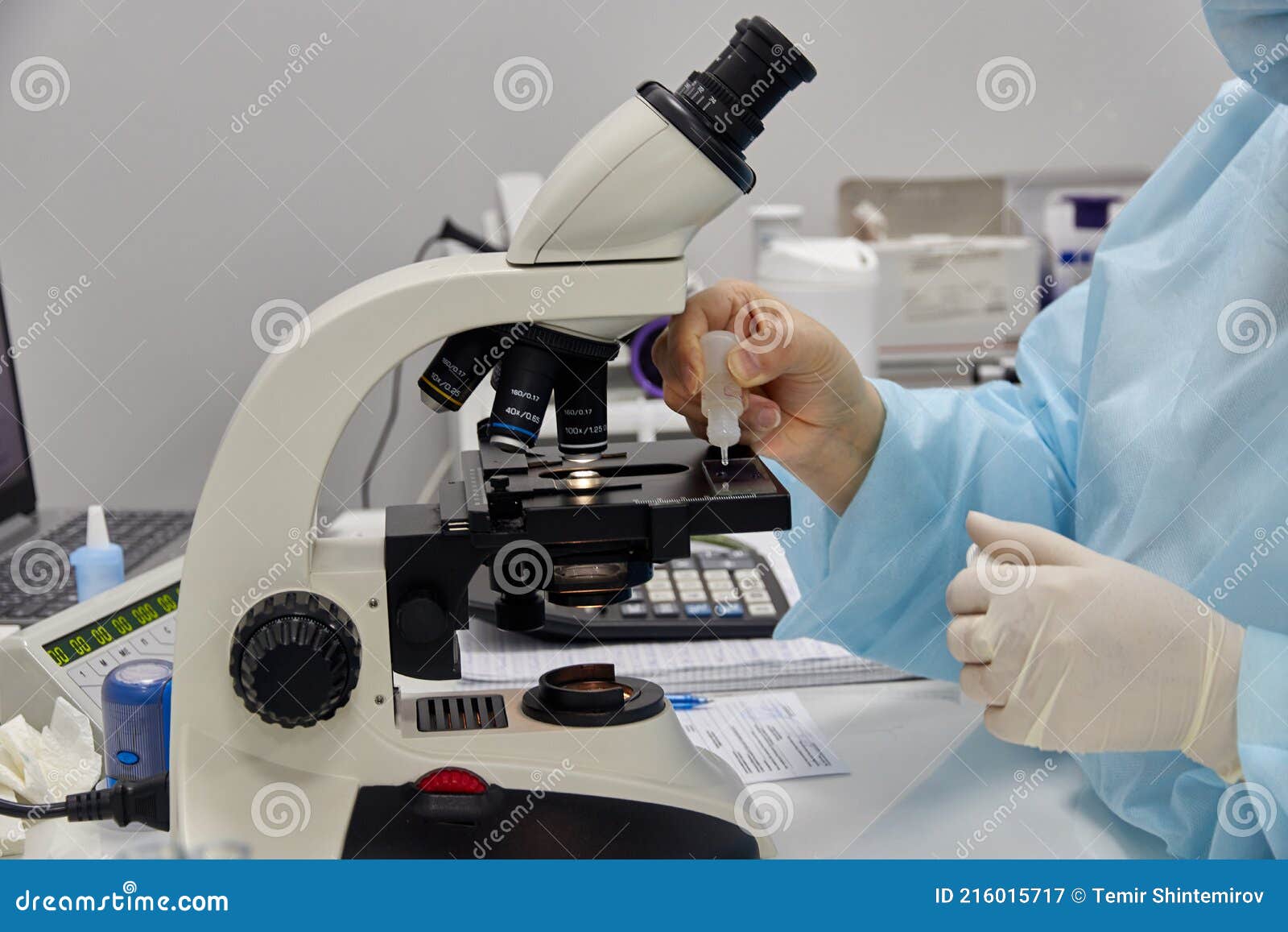 Doctor Performing a Blood Test on a Microscope Stock Image - Image of ...