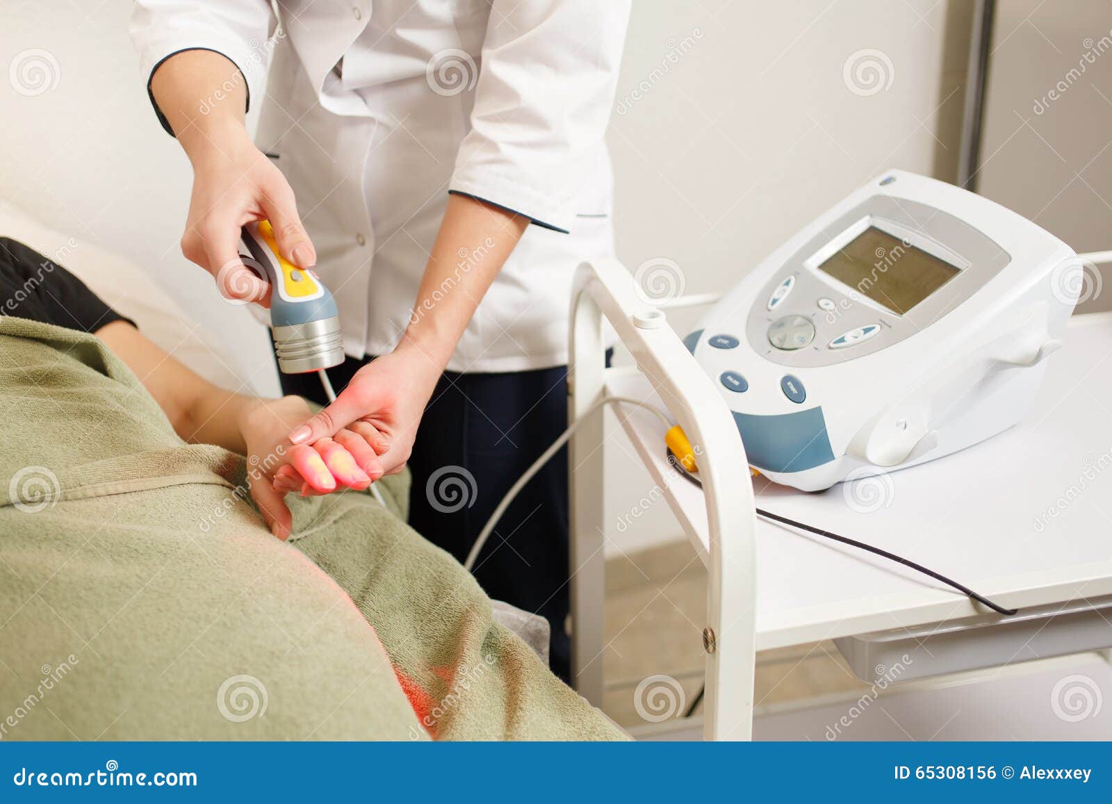 Doctor Performs the Procedure of Laser Therapy on the Patient S Stock ...