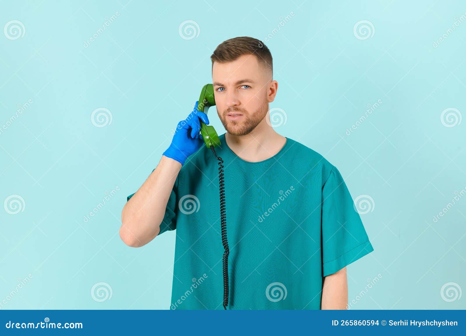 Doctor with Phone on a Blue Background. Doctor Call Concept Stock Photo ...