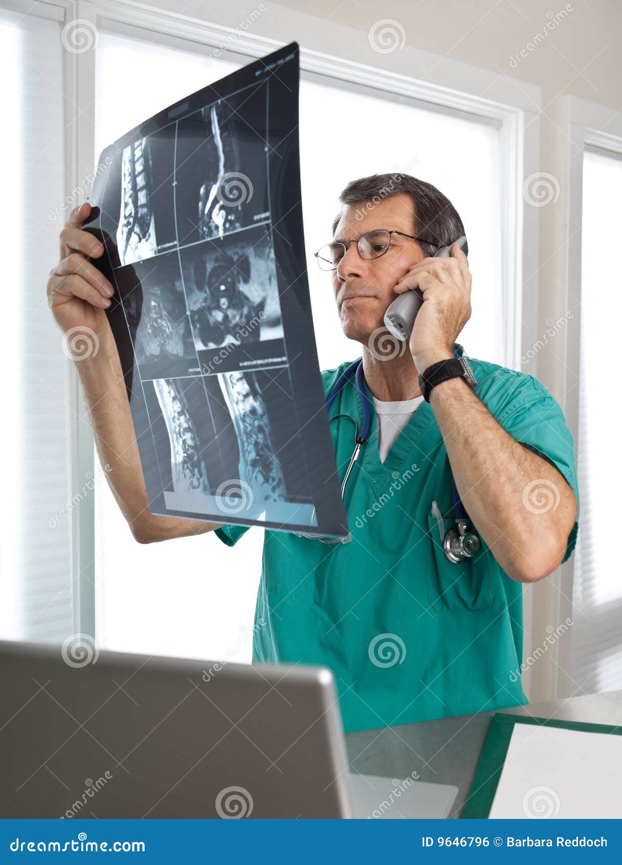 Doctor on Phone Discussing Patient S Spinal Scans Stock Photo - Image ...