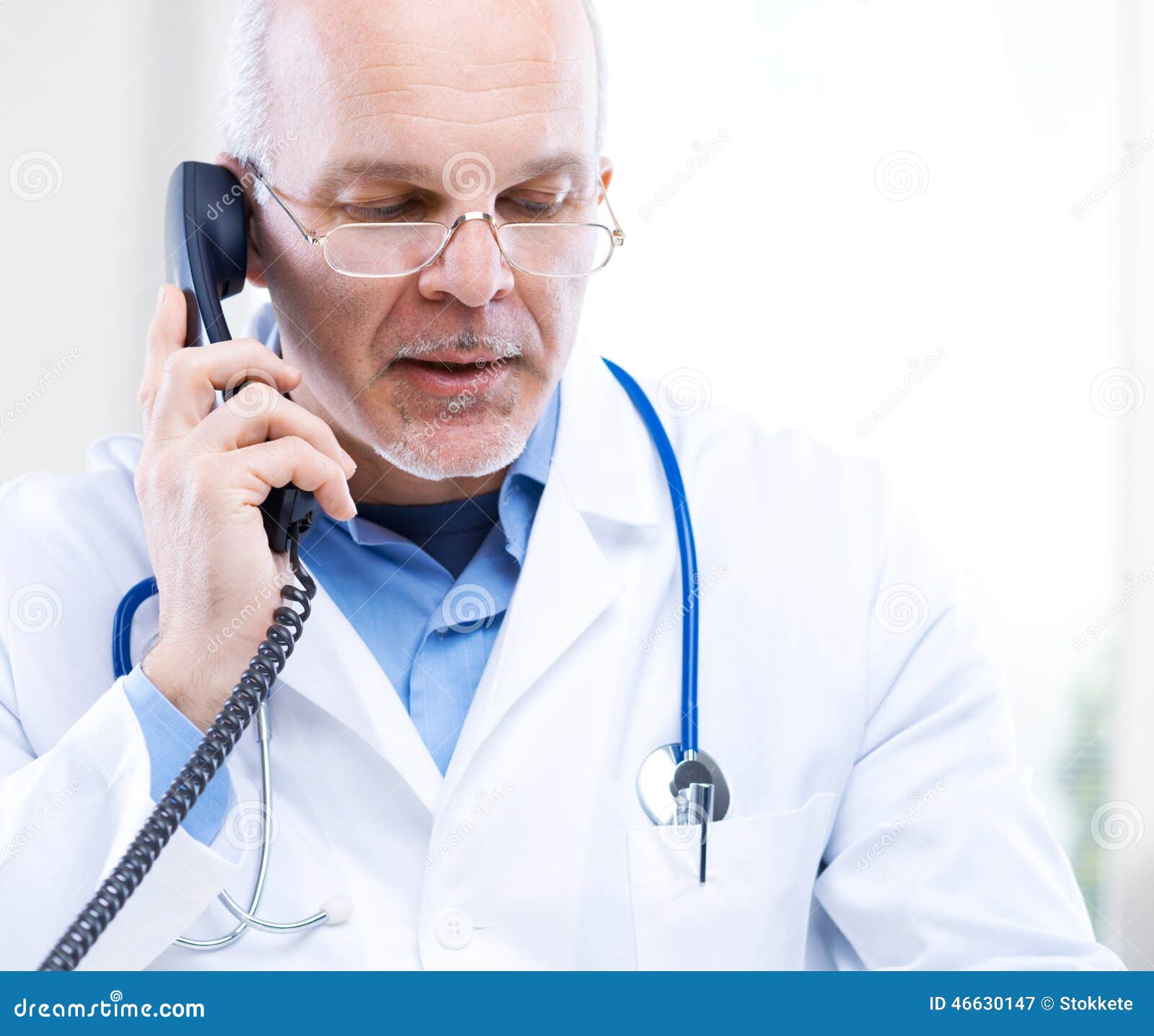 Doctor on the phone stock image. Image of equipment, expertise - 46630147