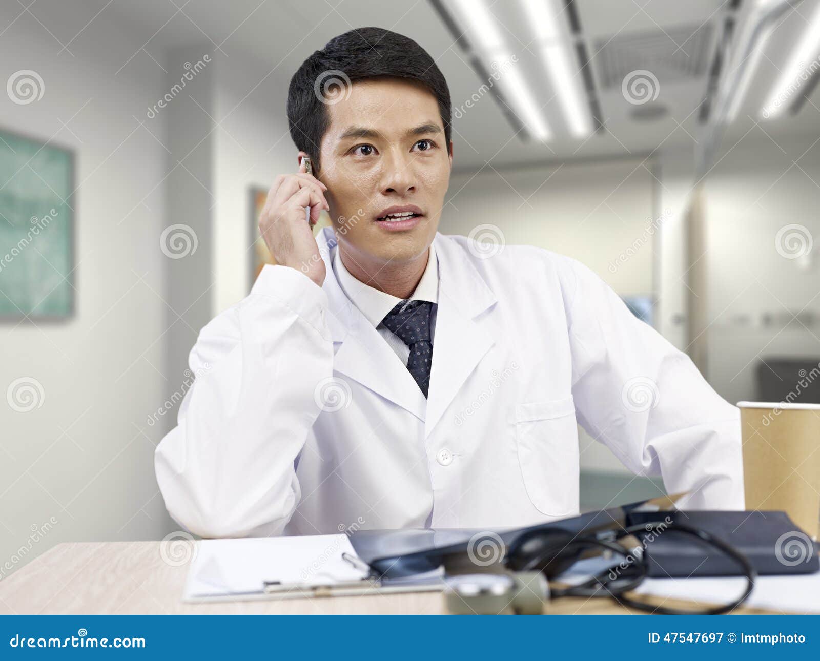 Doctor on the phone stock image. Image of korean, cellphone - 47547697