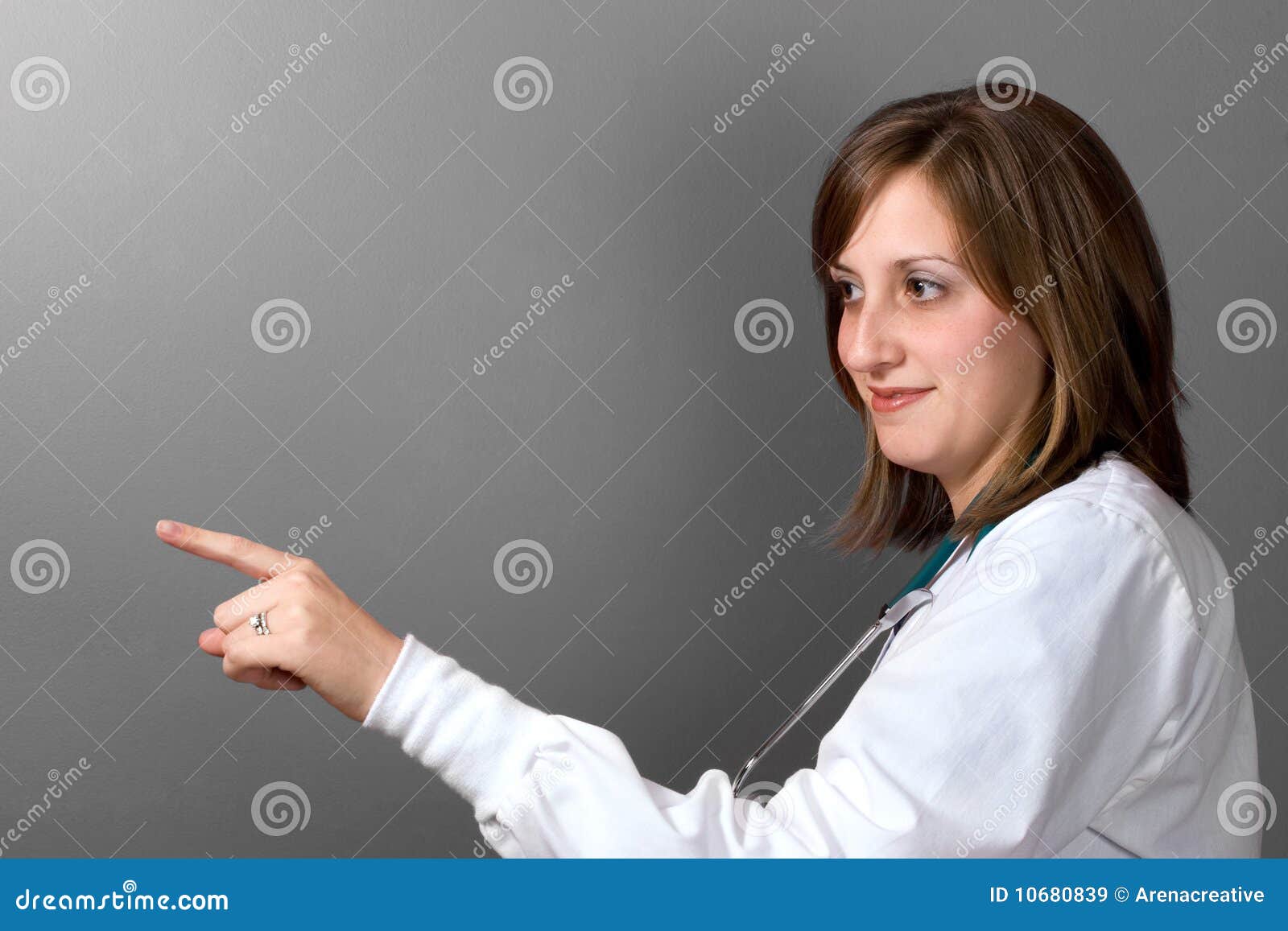 Doctor Pointing Left stock image. Image of pointing, medication - 10680839