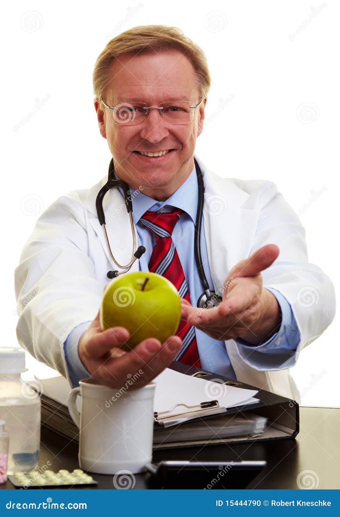 Doctor Pointing To an Apple Stock Photo - Image of happy, diet: 15444790