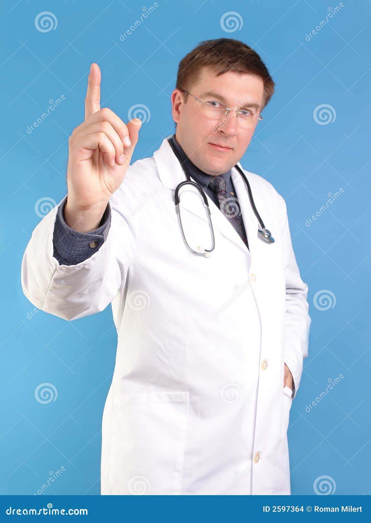 Doctor pointing up stock photo. Image of professional - 2597364