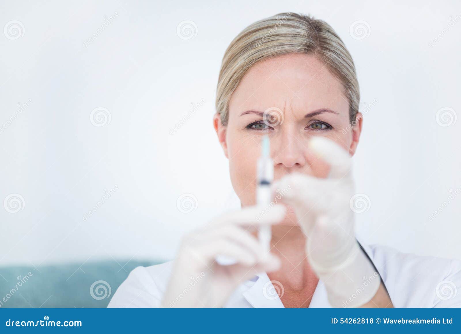 Doctor preparing syringe stock photo. Image of service - 54262818