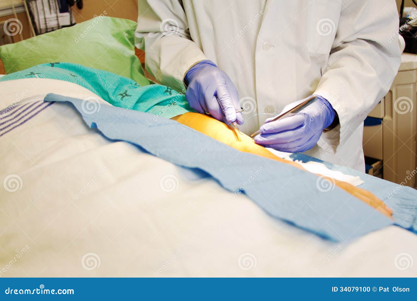 Doctor preparing to suture stock photo. Image of supplies - 34079100