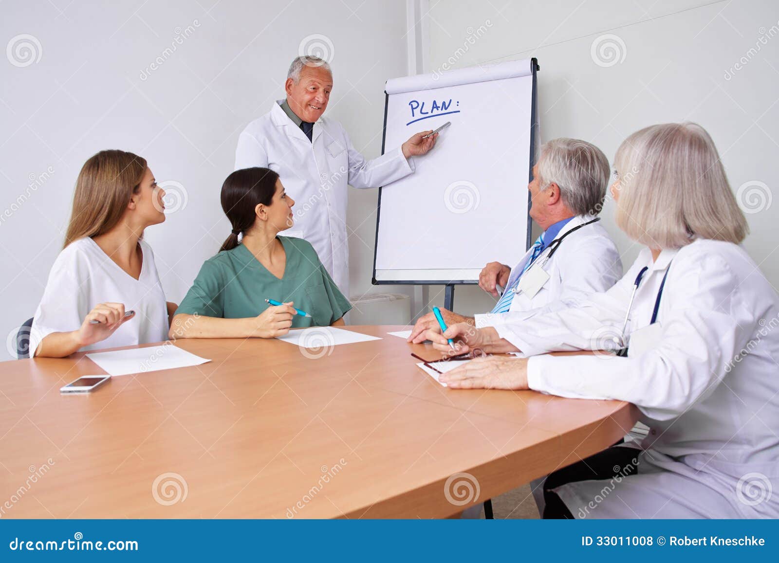 Doctor in a Presentation Explaining Plan Stock Photo - Image of ...