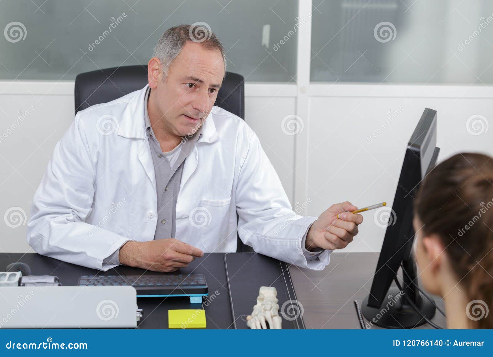 Doctor Presenting Results on Computer Stock Photo - Image of ...