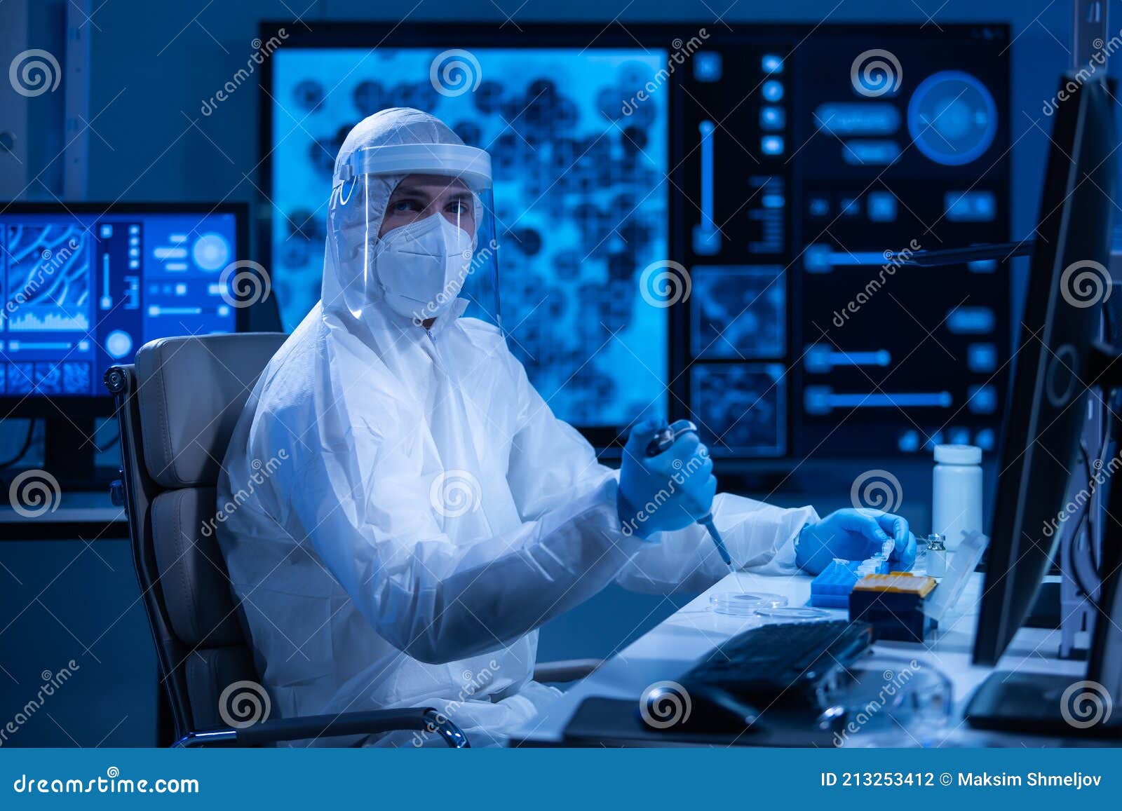 Doctor in Protective Suit is Doing a Science Experiments and Developing ...
