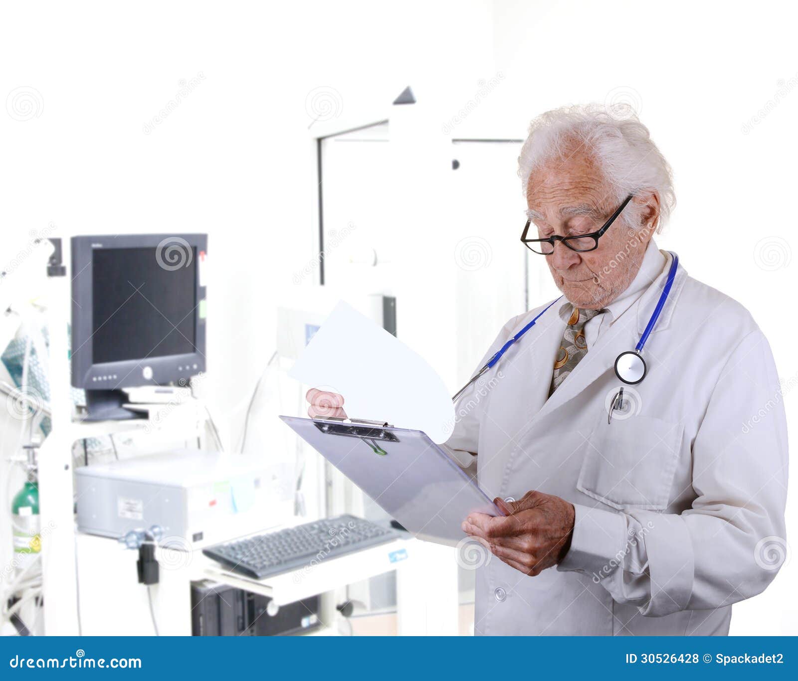 Doctor in Pulmonary Function Lab Looking at a Clipboard Stock Photo ...