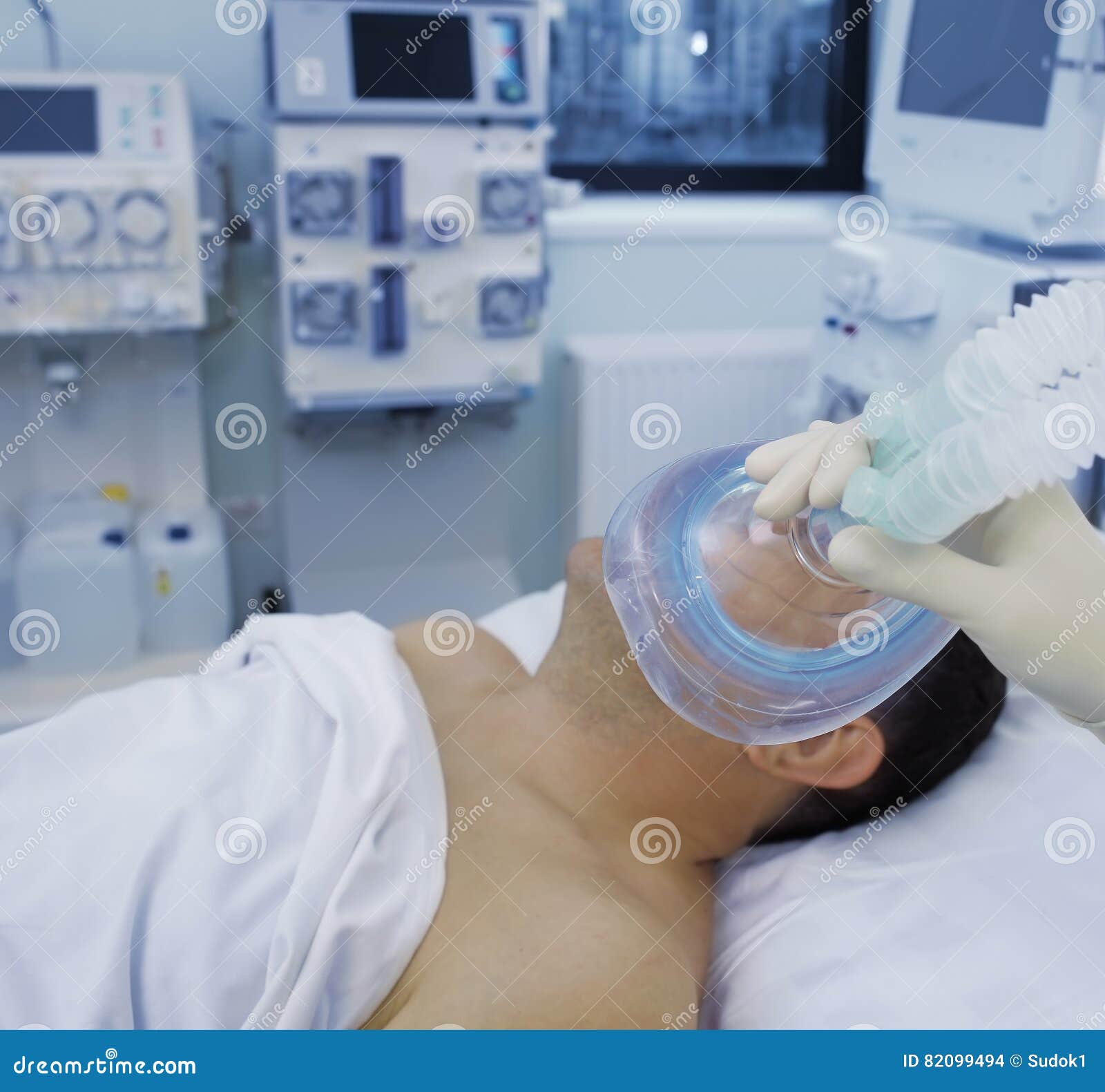Doctor Puts on the Patient Breathing Mask Stock Photo - Image of ...