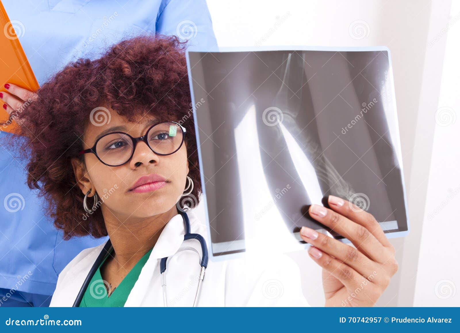 Doctor with radiography stock image. Image of services - 70742957