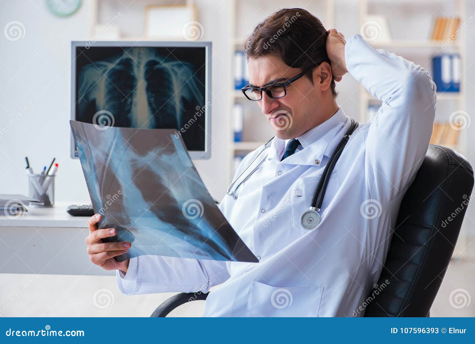 The Doctor Radiologist Looking at X-ray Images Stock Image - Image of ...