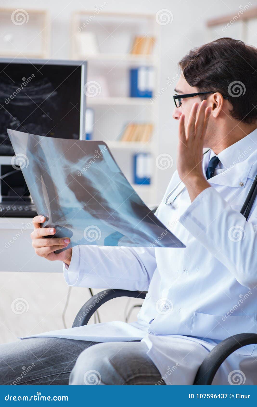 The Doctor Radiologist Looking at X-ray Images Stock Image - Image of ...