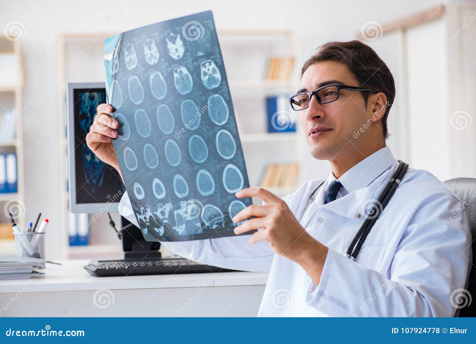 The Doctor Radiologist Looking at X-ray Images Stock Photo - Image of ...