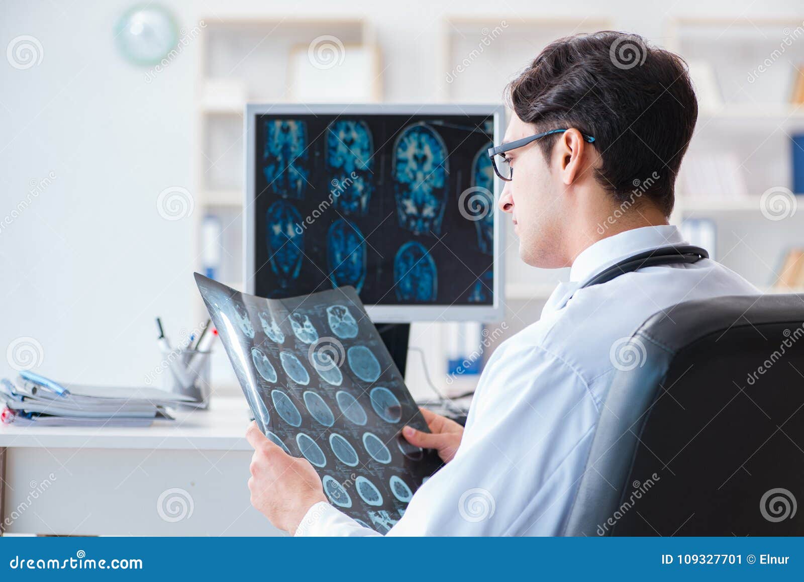 The Doctor Radiologist Looking at X-ray Images Stock Image - Image of ...