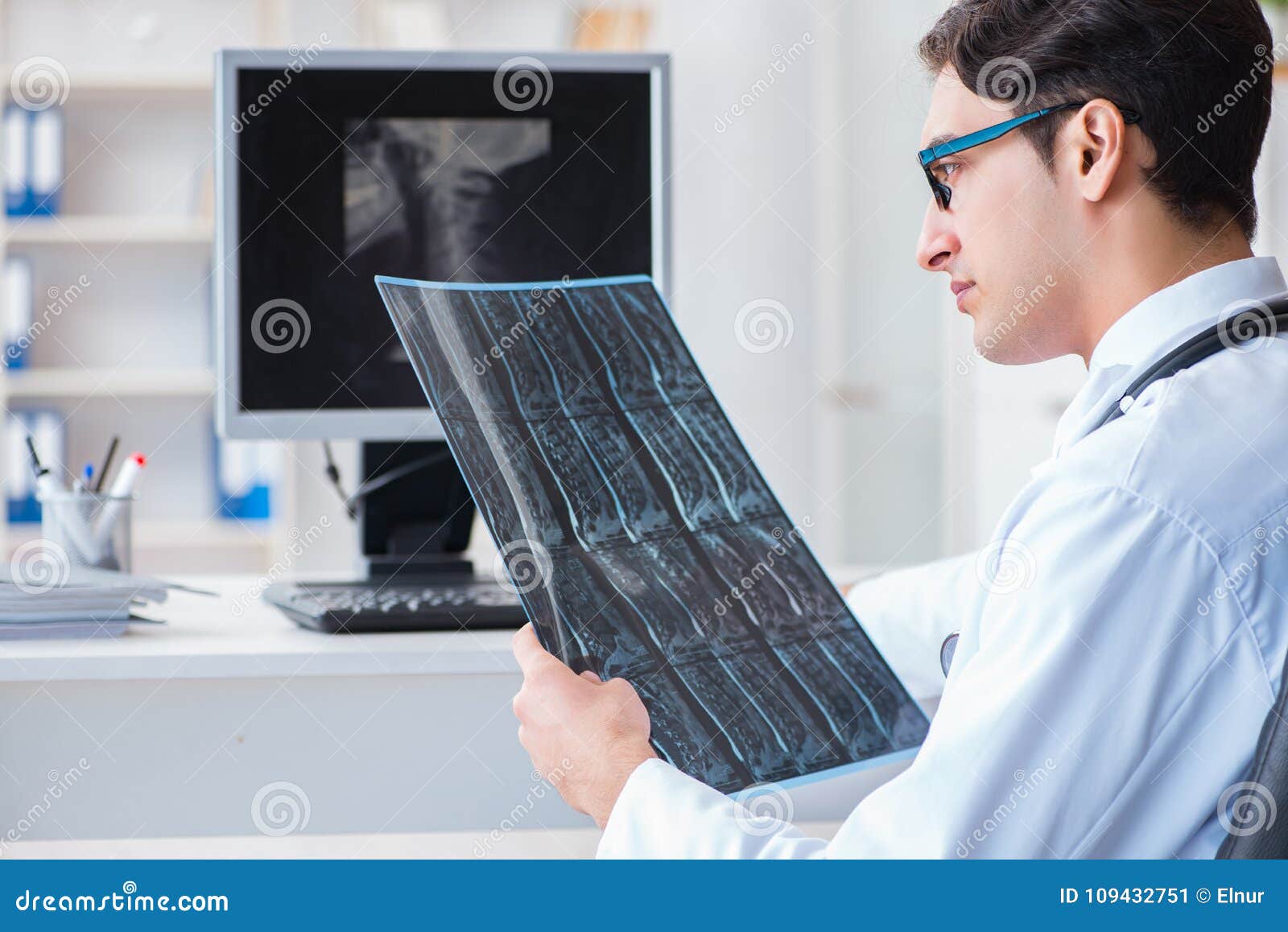 The Doctor Radiologist Looking at X-ray Images Stock Image - Image of ...