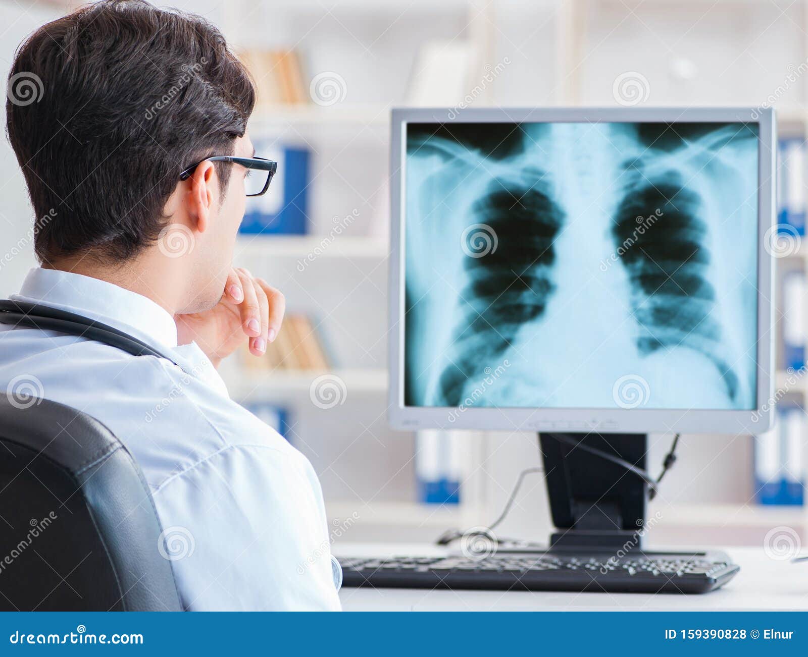 Doctor Radiologist Looking at X-ray Images Stock Photo - Image of ...